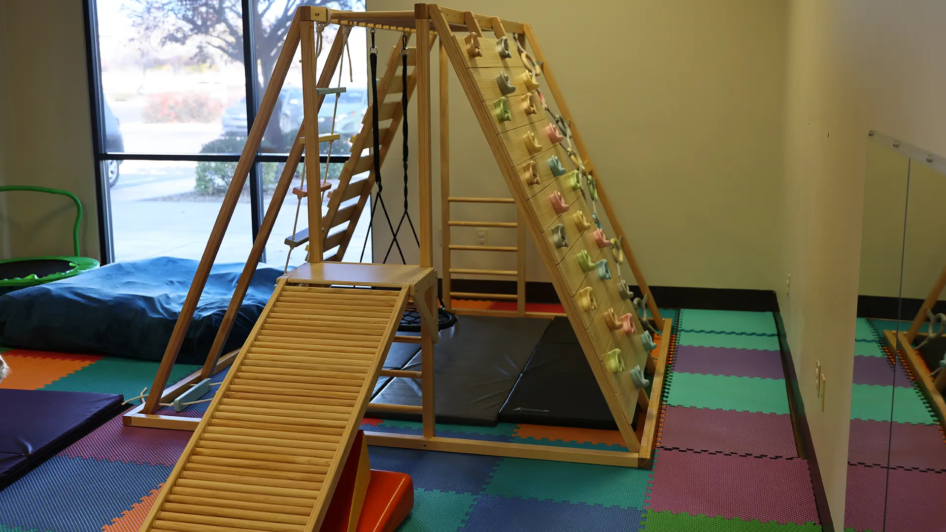 pediatric-therapy-climbing-structure-juntos-therapy-services rock wall ...